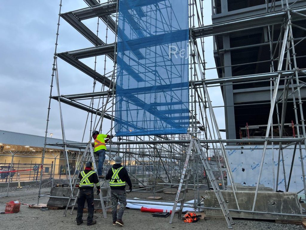 Massive Building Wrap at YVR Airport | Vancouver | Multigraphics